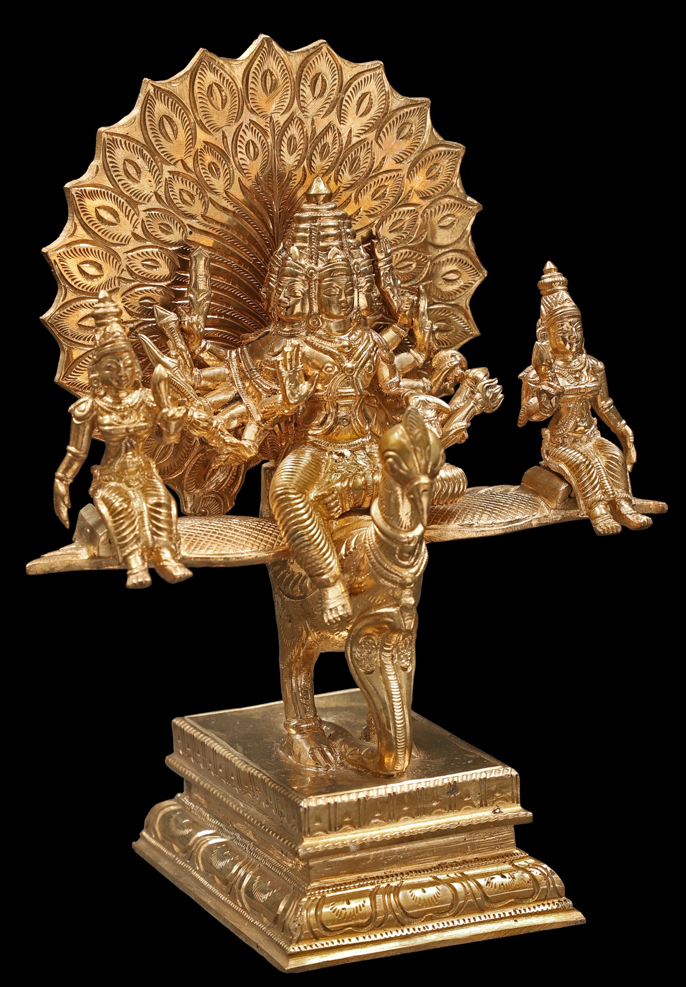 Karttikeya With His Two Consorts Seated On His Mount Peacock